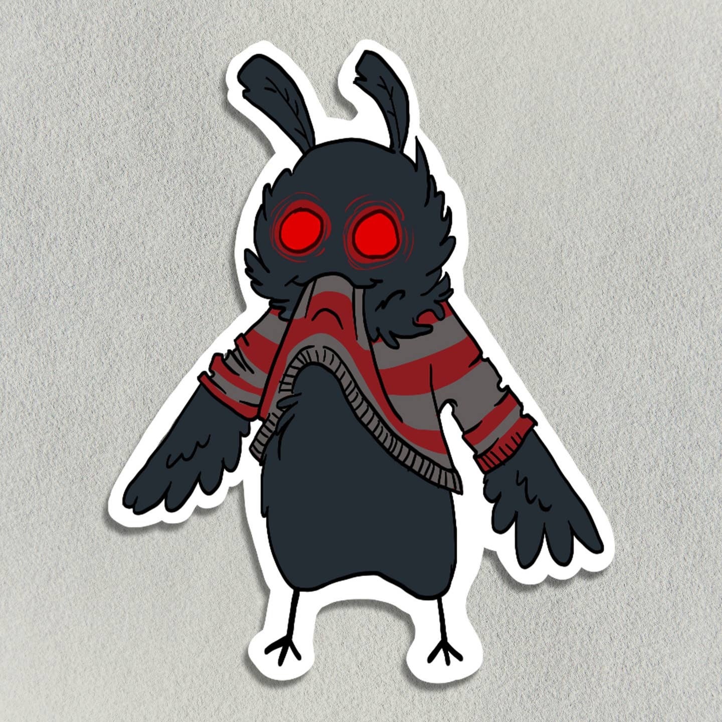 Cute Mothman Eating His Own Sweater Vinyl Sticker | Atomic Horror